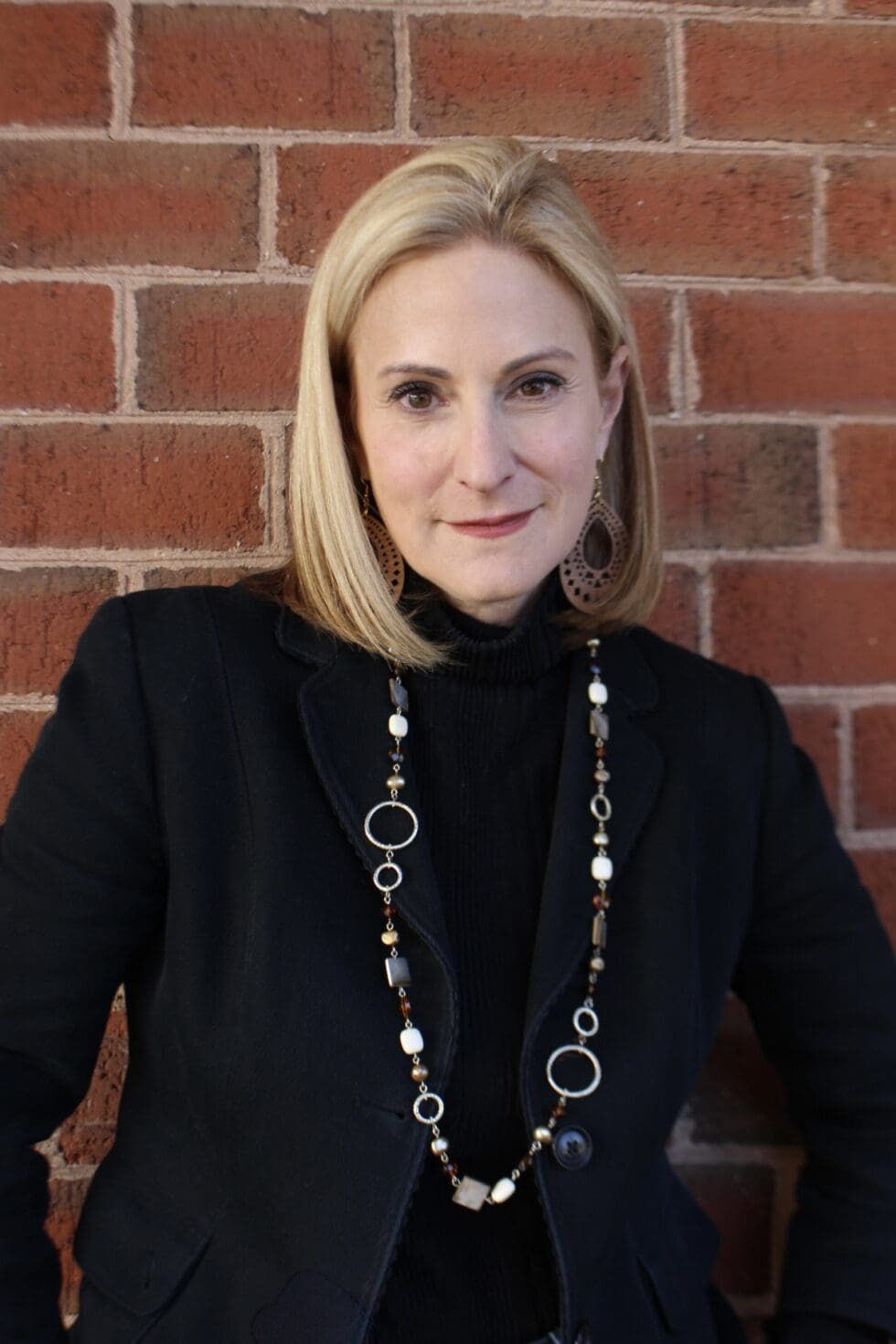 Kim L. Como | Family & Children's Association